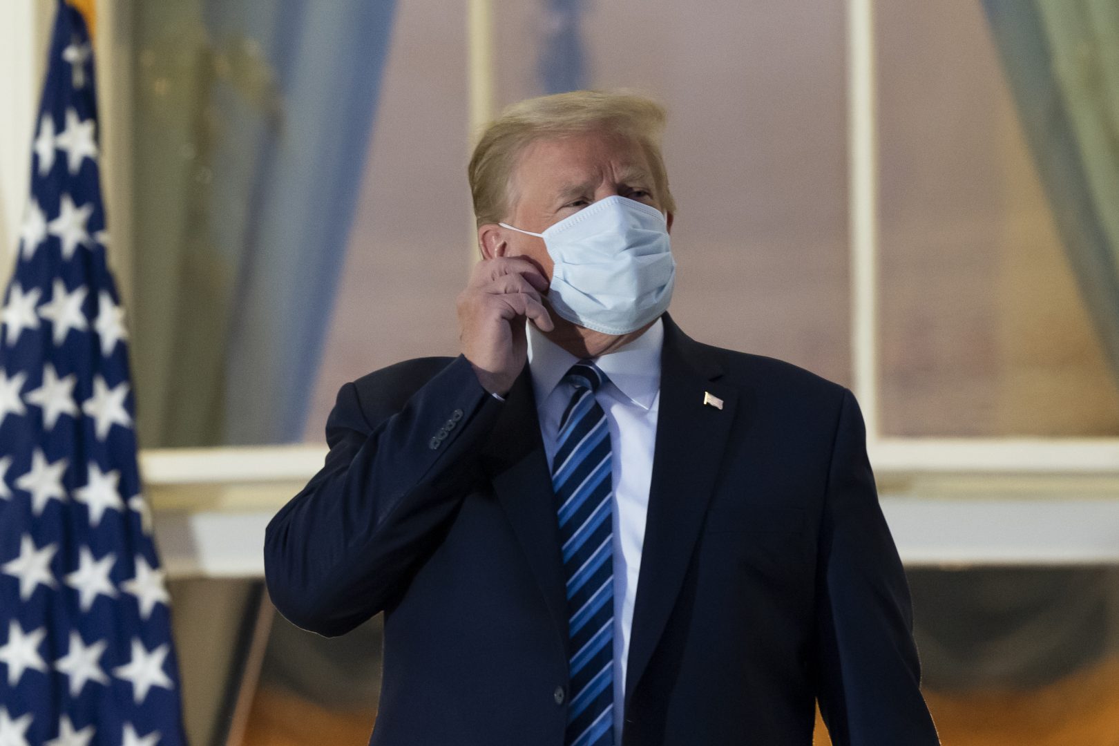 President Trump returns to the White House, removes mask despite COVID ...